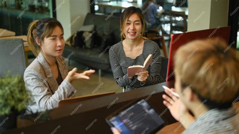 Premium Photo Young Software Developers Team Brainstorming Working On