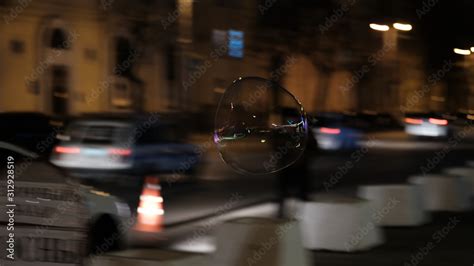 Soap Bubble In The Night City Reflection Of Light On A Soapy Surface