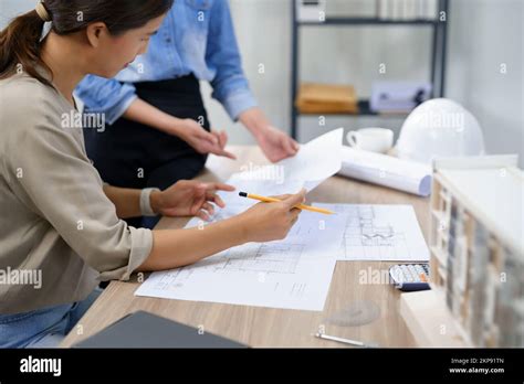 Engineering Construction Concept Two Female Engineers Brainstorming