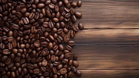 Aesthetic Coffee Beans Resting On A Textured Gray Wooden Table