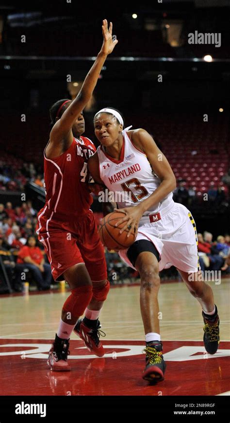 Maryland S Alicia Devaughn Right Drives To Shoot As North Carolina States Kody Burke Defends