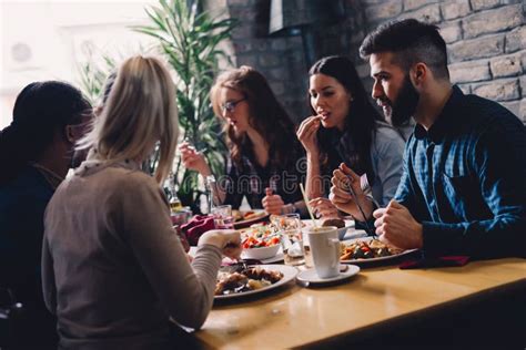 Group Of Happy Business People Eating In Restaurant Stock Image Image