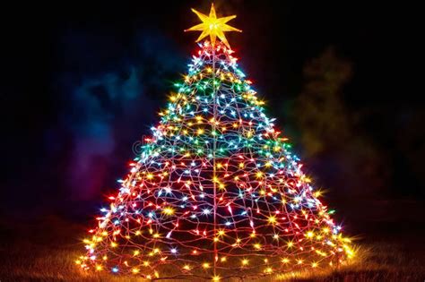 A Christmas Tree Entirely Made Of Twinkling String Lights Arranged In