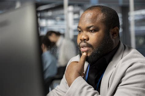 Man Working In Data Center Analyzing Software Logs Metrics On Pc Stock Image Image Of Device