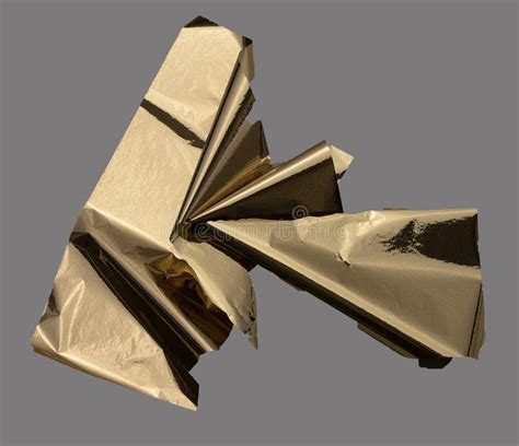 Golden Foil Folded Into Sharp Angular Geometric Shapes Creates A Modern Abstract Design Stock