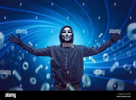 Hooded Man With Mask Expression Against Binary Code In Background Stock