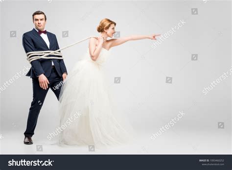 Husband And Wife Pull The Rope Photos And Images Shutterstock
