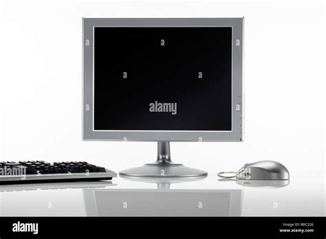 Silver LCD Monitor With Mouse And Keyboard Stock Photo Alamy