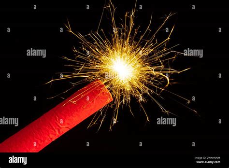Ignited firework, firecracker, firecracker with burning fuse Stock Photo - Alamy