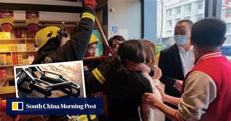 ‘life And Death Firefighters Free Drunk Chinese Women From Padlocked
