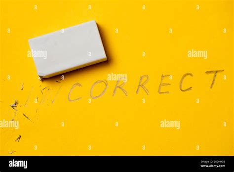 incorrect and correct on a yellow background correction concept stock