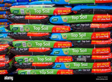 A Stack Of Bags Of Top Soil In A Garden Centre Stock Photo Alamy