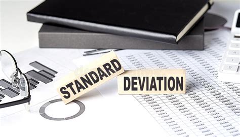 Standard Deviation Text On A Wooden Block With Chart And Notebook