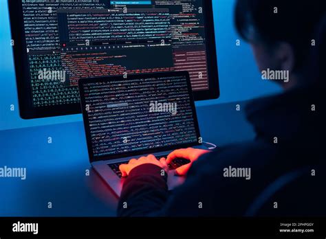Man Using Computer And Programming To Break Code Cyber Security Threat
