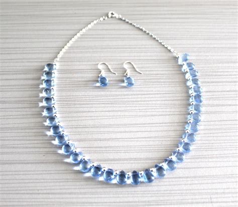 Teardrop Shape Design Blue Glass Beads Adorns Necklace On An 18 Inch