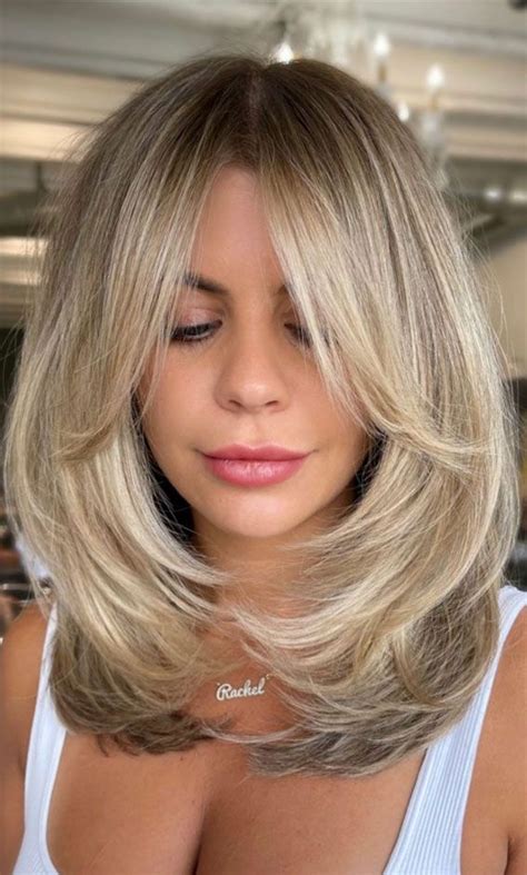 50 Versatile Layered Haircuts Blonde Medium Length Layered Haircut