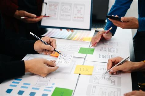 premium photo close up view of ui developer team brainstorming on