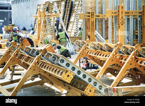 Workers Assemble Concrete Form Sections On Tower One Site Lower