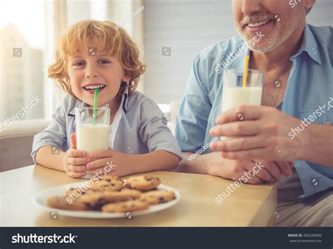 Handsome Grandpa Grandson Drinking Milk Smiling Stock Photo Edit Now