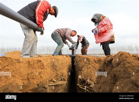 LUANNAN China March 18 2022 Workers Are Laying Water Saving