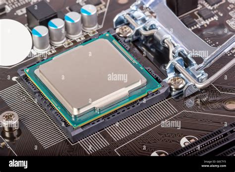 CPU Socket On Motherboard With Installed Processor Stock Photo Alamy