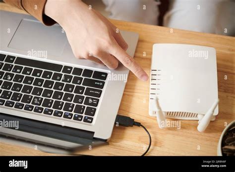 Closeup Image Of Man Setting Up Wi Fi Router To Get Internet Connection Stock Photo Alamy
