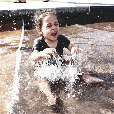 Premium Photo Full Length Of Boy Splashing Water
