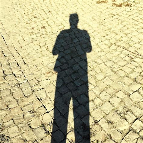 Premium Photo Shadow Of Person On Wall