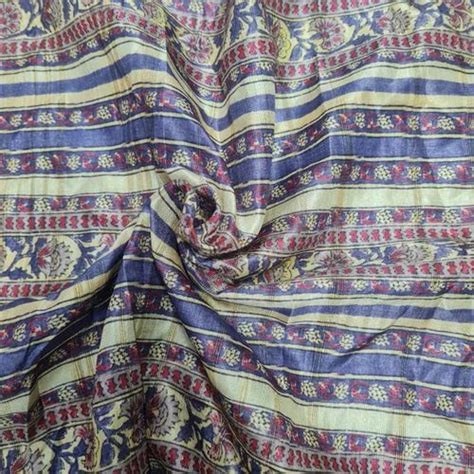 Cream With Blue Traditional Floral Print Dobby Tusser Silk Fabric At Rs
