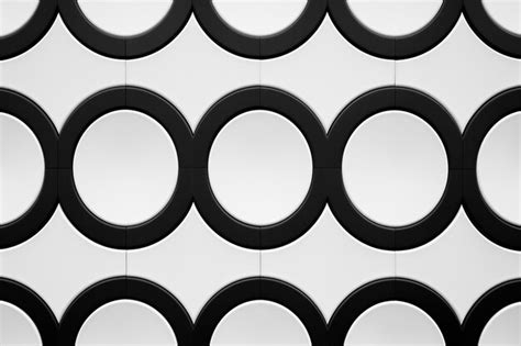 Minimalist Black And White Interlocking Circle Grid Pattern Premium Ai Generated Image