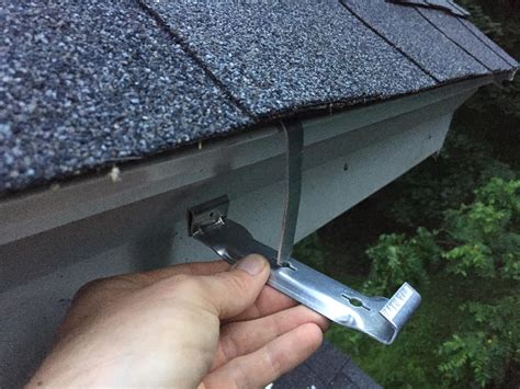 How To Install Gutter Hanger Straps Underneath Asphalt Shingles Rhomeimprovement