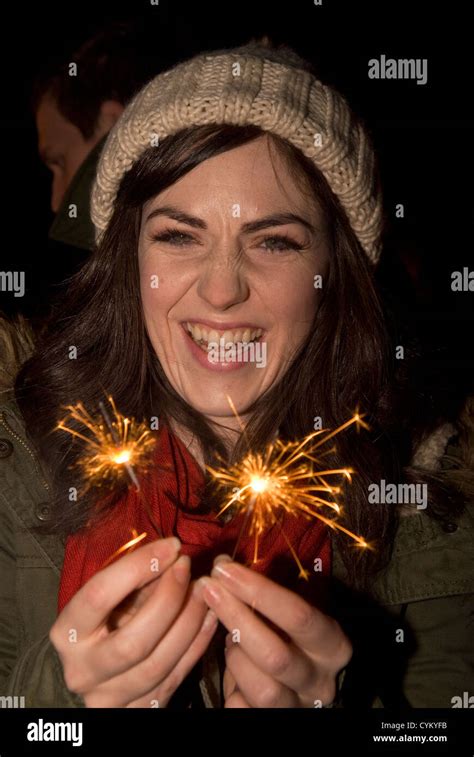 26 Year Old Girl Having Fun With Sparklers On Bonfire Night