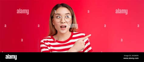 Amused Wondered Cute Asian Blond Modern Girl Surprised Looking