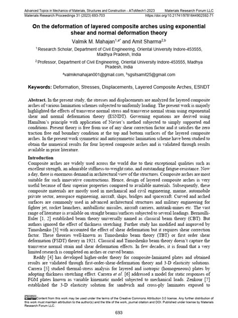 on the deformation of layered composite arches using exponential shear