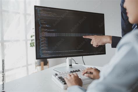 Two Programmers Looking At Computer Screen Programmer Design Custom
