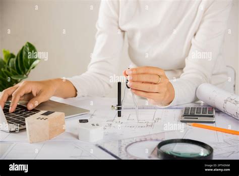 Architectural Project Workplace Architect Typing Laptop Keyboard To Review Design Of House