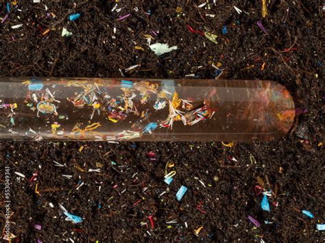 Microplastics In Soil A Test Tube With Soil Sample Soil Contaminated With Mineral