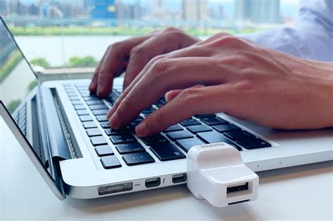 this tiny yet genius device backs up your phone every time you charge