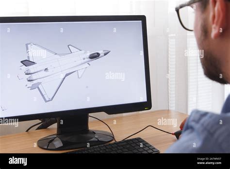 engineer constructor designer in glasses working on a personal