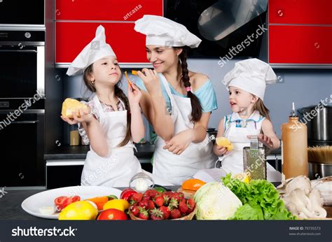 Mom Teaches Two Daughters Cook Kitchen Stock Photo Shutterstock