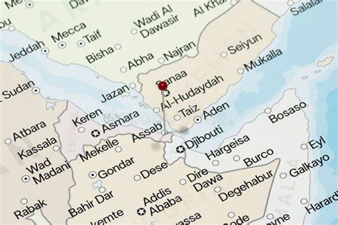 Macro Photo Of A Red Pin Needle Into Assab City Of Eritrea Political