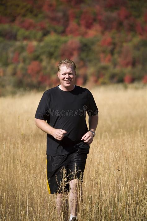 Man Running In Grass Stock Image Image Of Grass Jogging 11233583