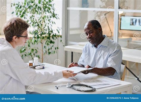 Doctor Giving Prescription To Patient Stock Image Image Of Desk
