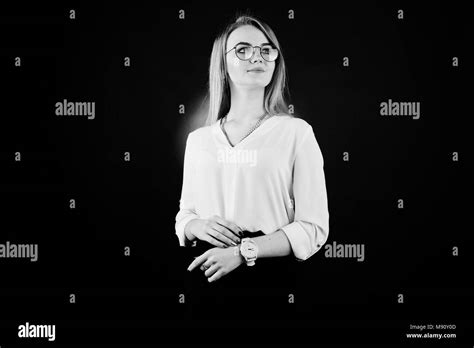 Studio Portrait Of Blonde Businesswoman In Glasses White Blouse And