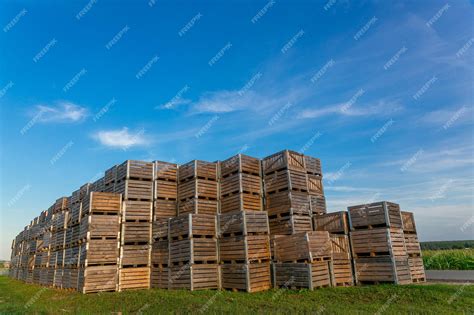 Premium Photo A Large Stack Of Wooden Boxes For Picking Apples In An