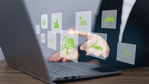 Co2 배출 감소 개념 노트북을 사용하여 일하는 사업가 기술 넷 제로 및 탄소 중립 녹색 비즈니스 및 재생 가능 에너지 기반 개발 기후 변화 지구 온난화 감소에 대한 스톡