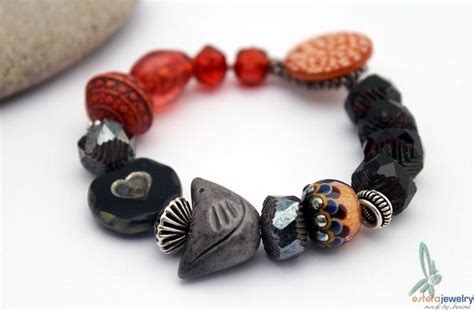 Bird Of Paradise Unique Artisan Bracelet In Orange Black And Gray