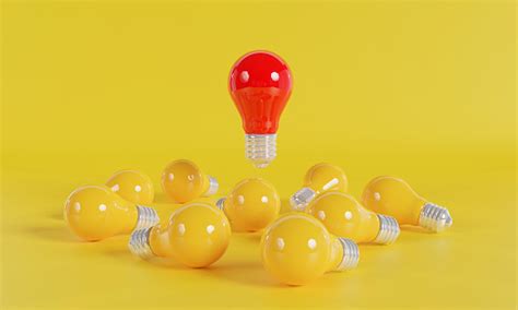 아이디어는 다른 전구의 그룹에 날아가는 빨간 전구 비즈니스 시작 또는 성공에 대한 목표를 가진 개념에 영감을 줍니다 인간의