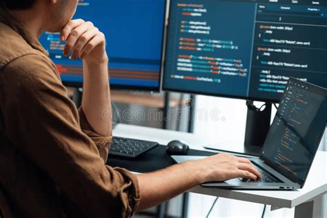 it developer working online software development coding on pc screens