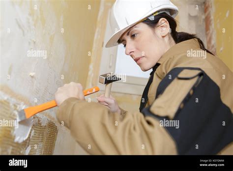 Female Builder With Hammer And Chisel In The Work Stock Photo Alamy